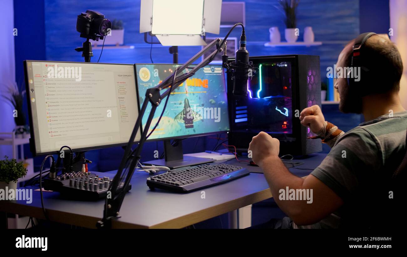 Streamer man winning space shooter online competition using ...