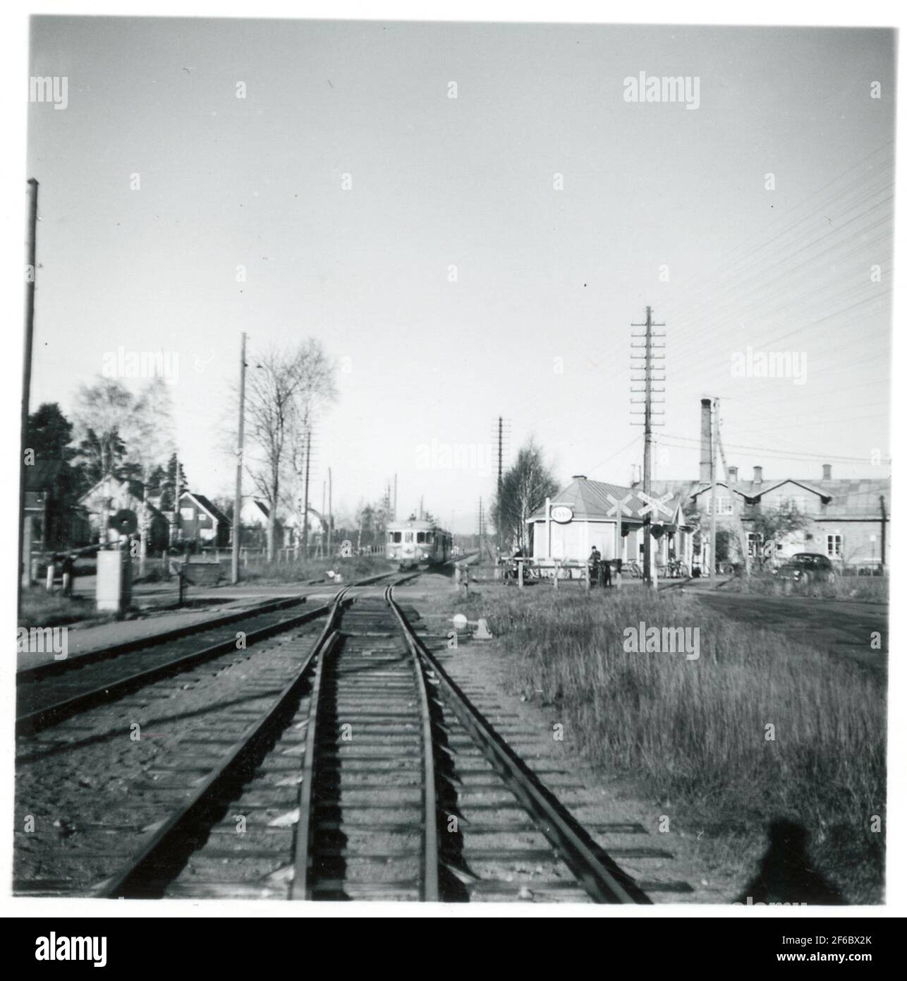 Railway transition in Rosenfors, incoming rail bus at Esso Macken Stock ...