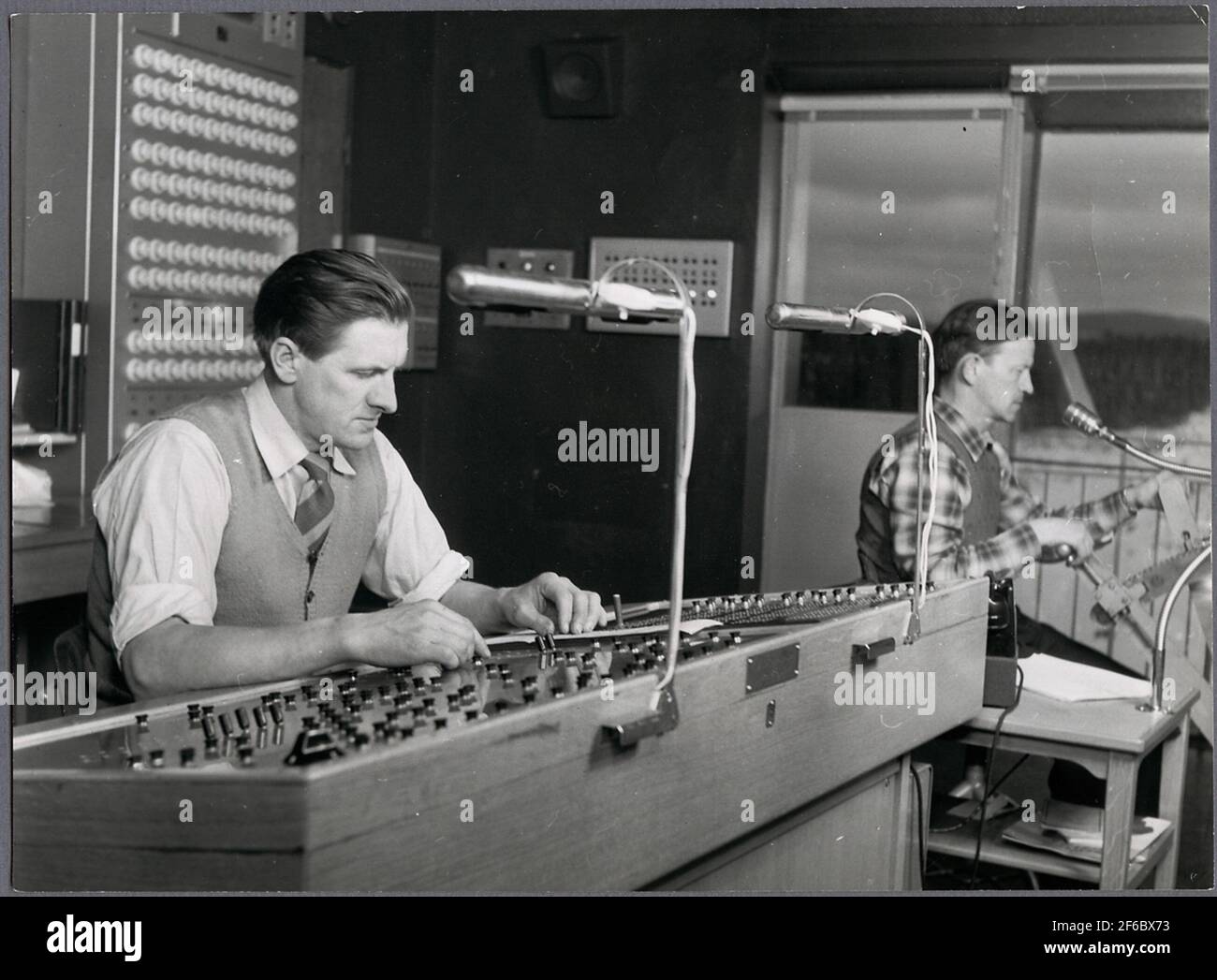 Ranger leader and braker at control panel Stock Photo - Alamy