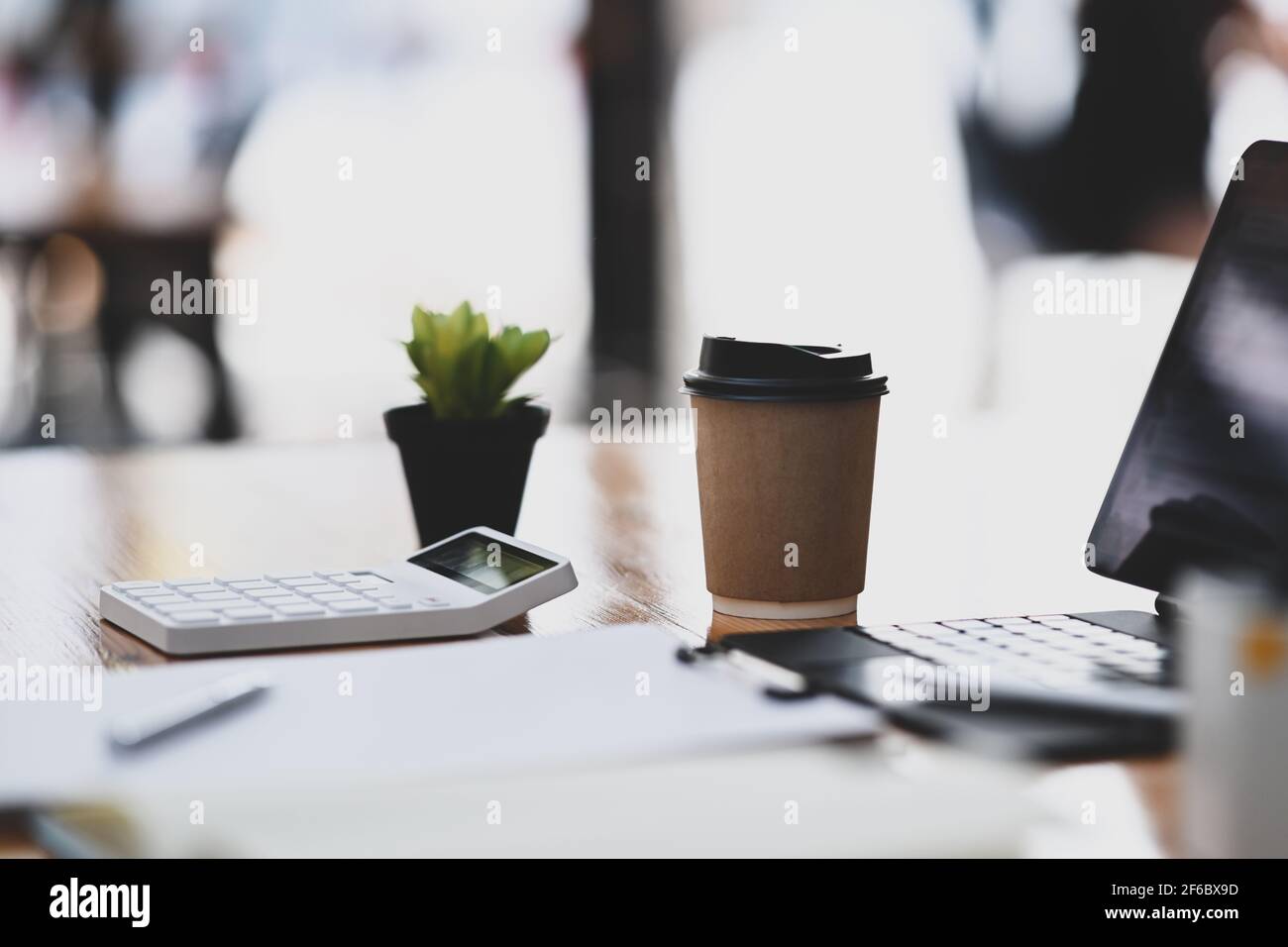 Accountant workplace with coffee cup, computer laptop, calculator and ...