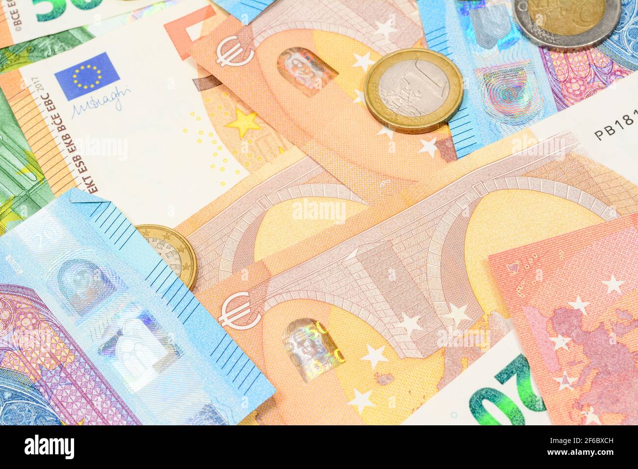 Euro coins and banknotes of different value. Various EU currency money ...