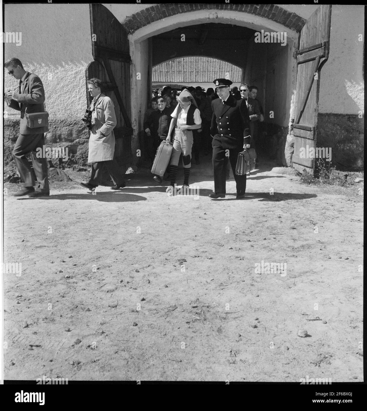 Alf Larsson leaves the home facing the trip as Nils Holgersson Stock ...