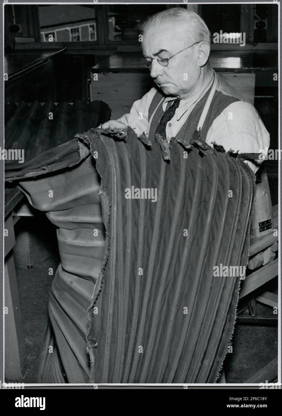 Örebro central workshop, repair of door bellows Stock Photo - Alamy
