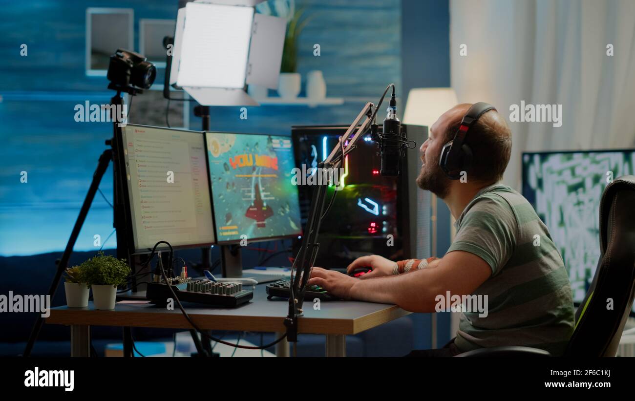 Happy streamer man winning space hi-res stock photography and images ...