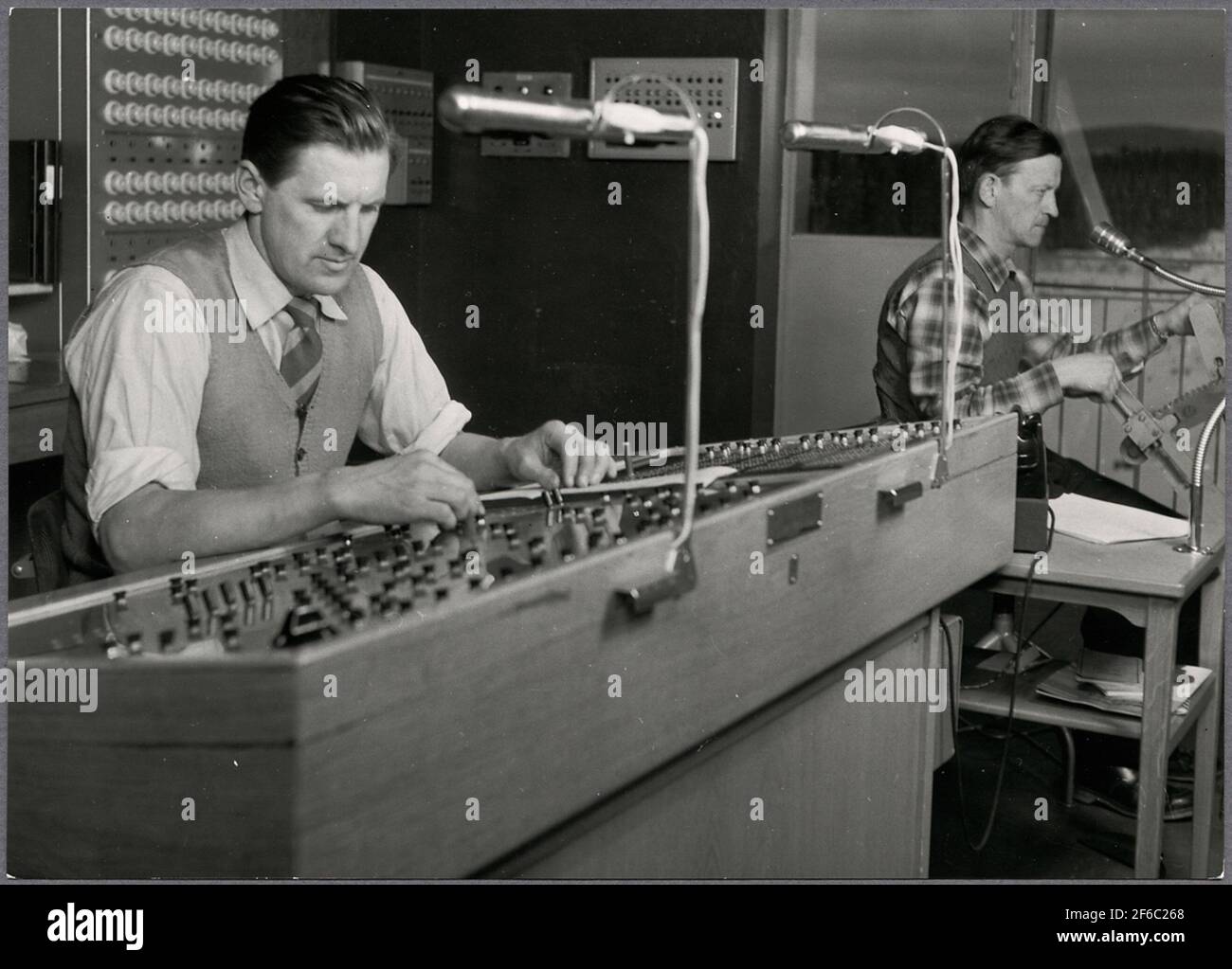 Ranger leader and braker at control panel Stock Photo - Alamy