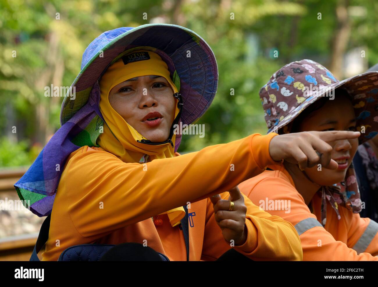 Bangkok, Thailand. 31st Mar, 2021. Thai railway workers take a break after clearing the tracks ...