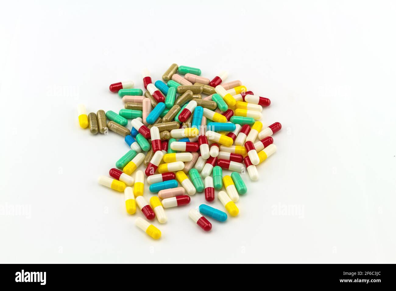 Colorful tablets medicine isolate on white background Stock Photo - Alamy