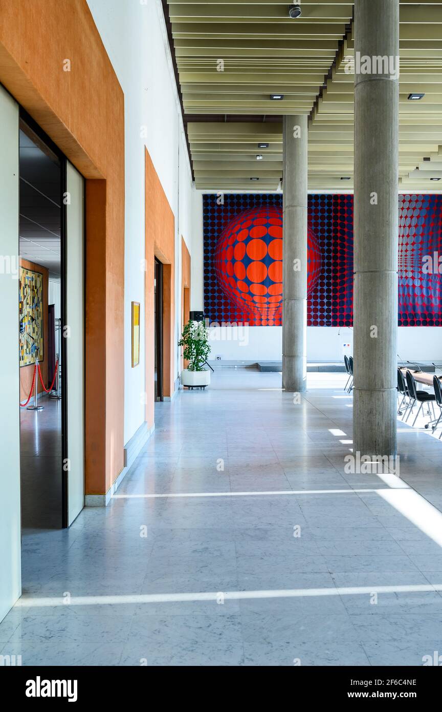 Along with wall view of conference hall entrance doors. Two concrete ...