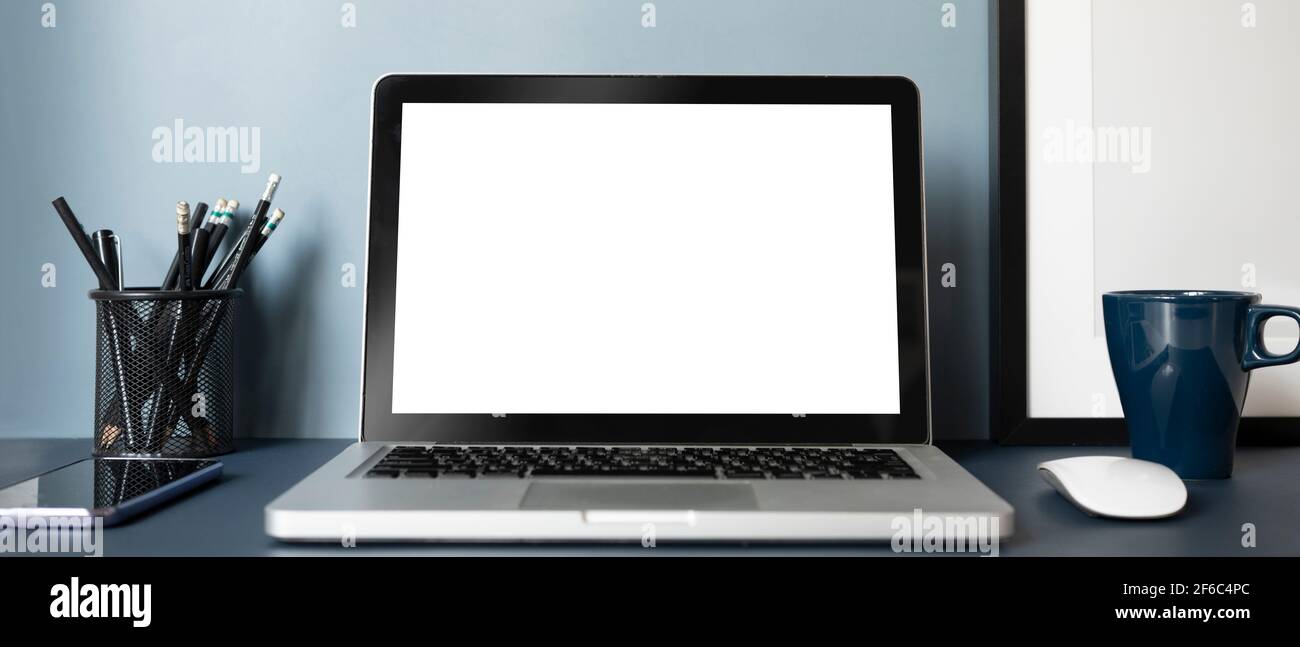 Horizontal photo of computer laptop with blank screen, smart phone ...