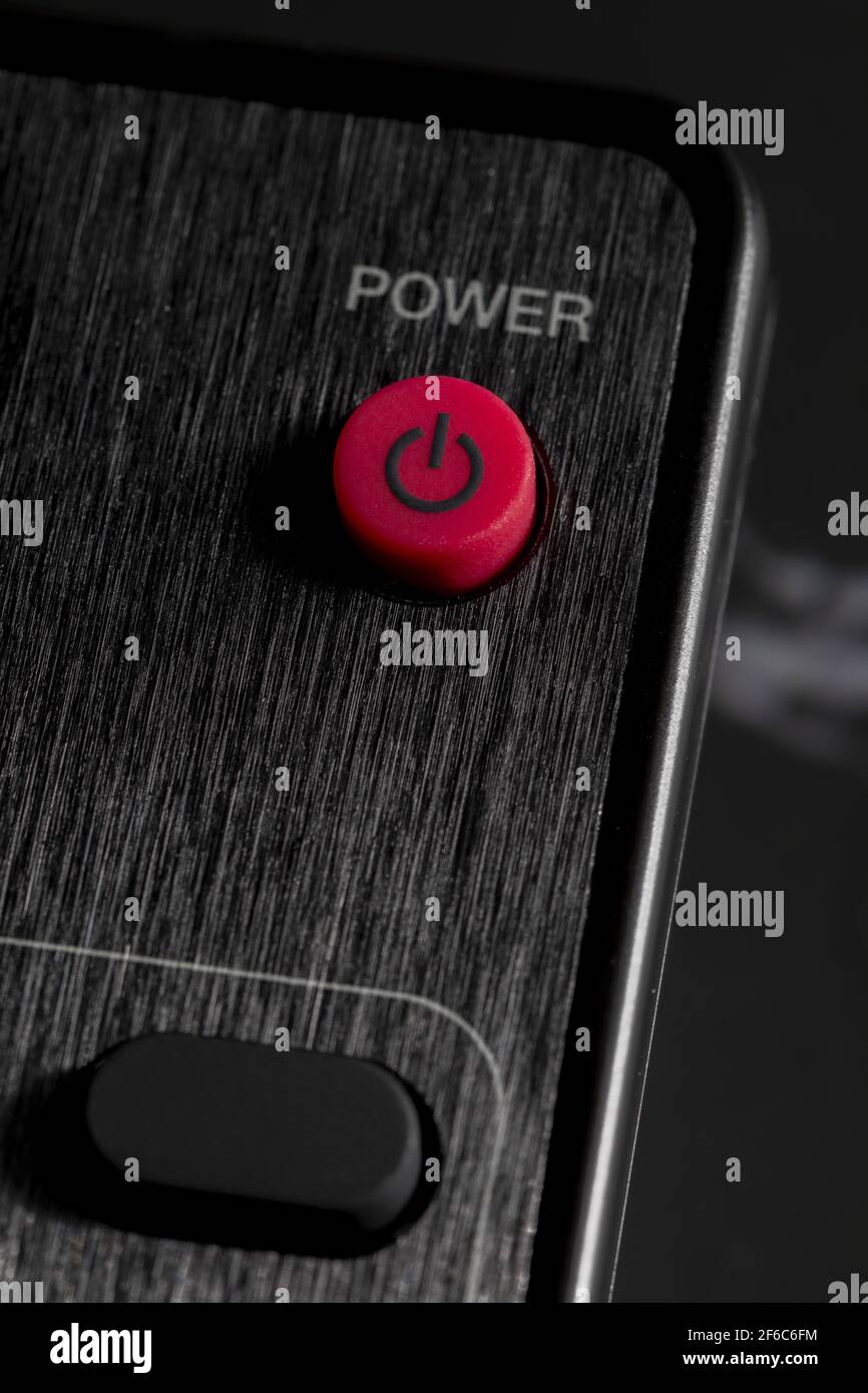 Close-up of Power button (on - off) on remote control for TV and audio ...