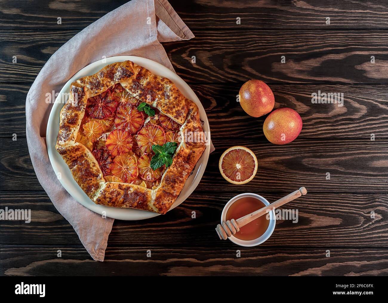 Homemade red blood oranges open pie galette Stock Photo - Alamy