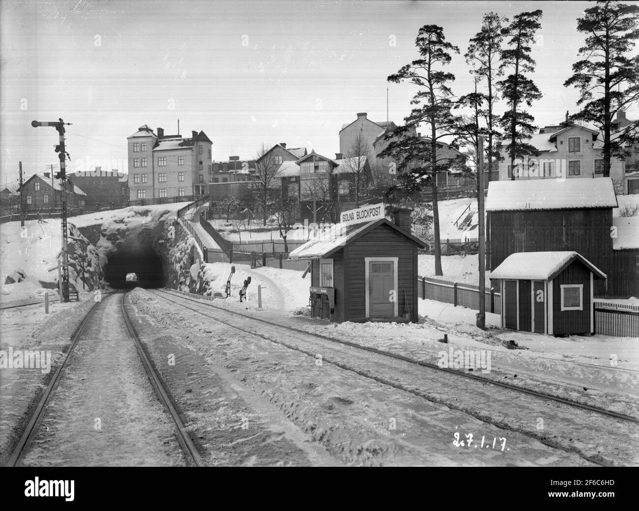Block post and road transition Stock Photo - Alamy