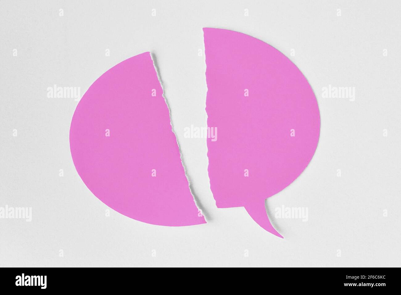 Broken pink speech bubble on white background - Concept of woman and ...