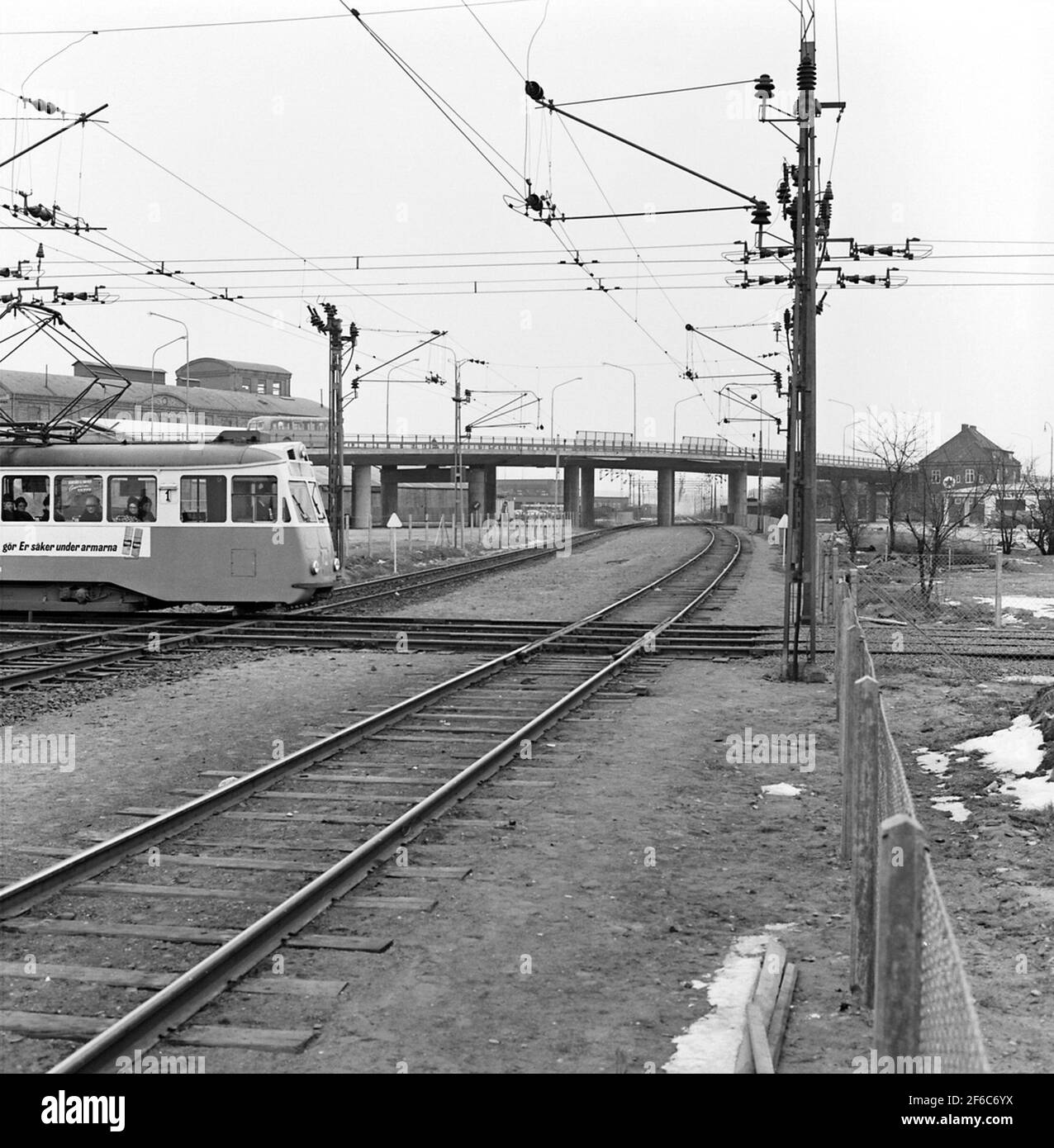 The tram crosses the railway Stock Photo - Alamy