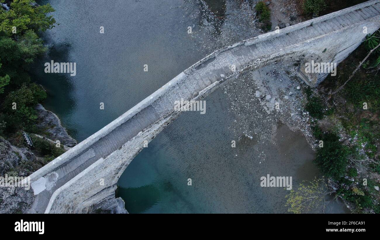 Old stone bridge of Konitsa, Aoos river, aerial drone view, Epirus ...