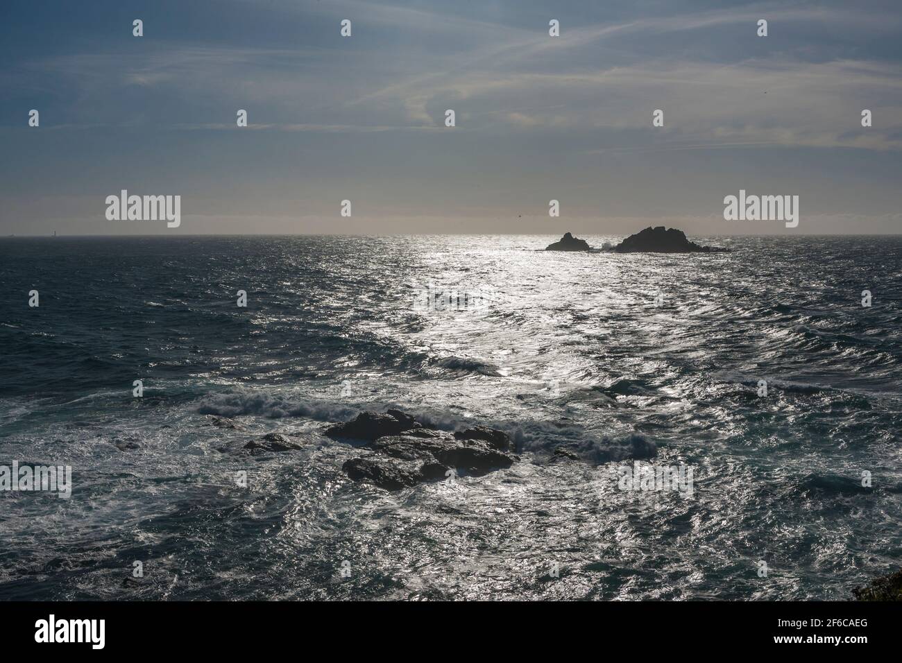 Surf on rocks on Cape Cornwall and the Brisons Rocks offshore, West ...