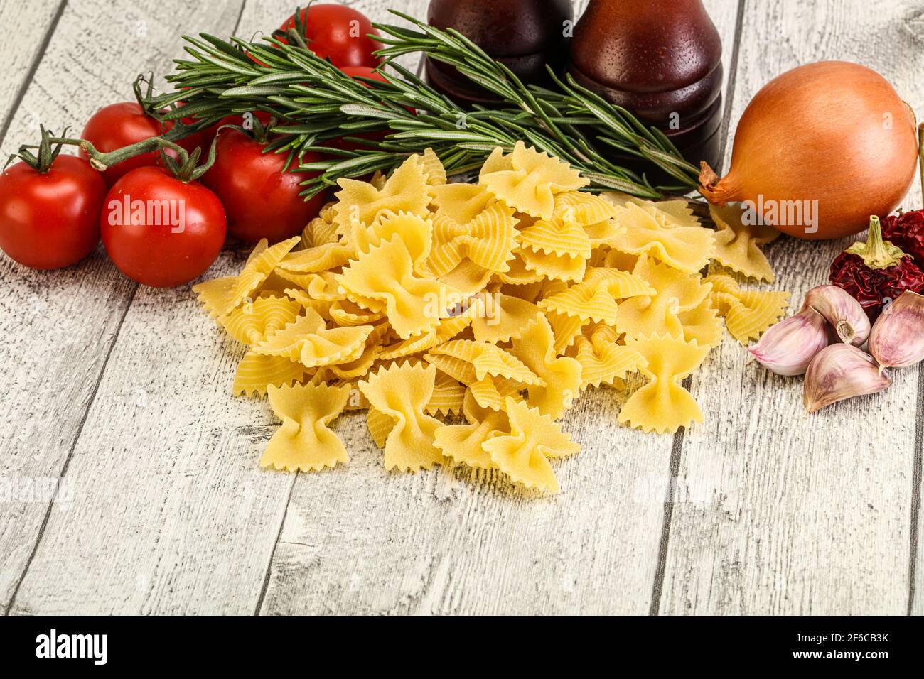 Raw Italian durum wheat farfalle pasta for cooking Stock Photo - Alamy