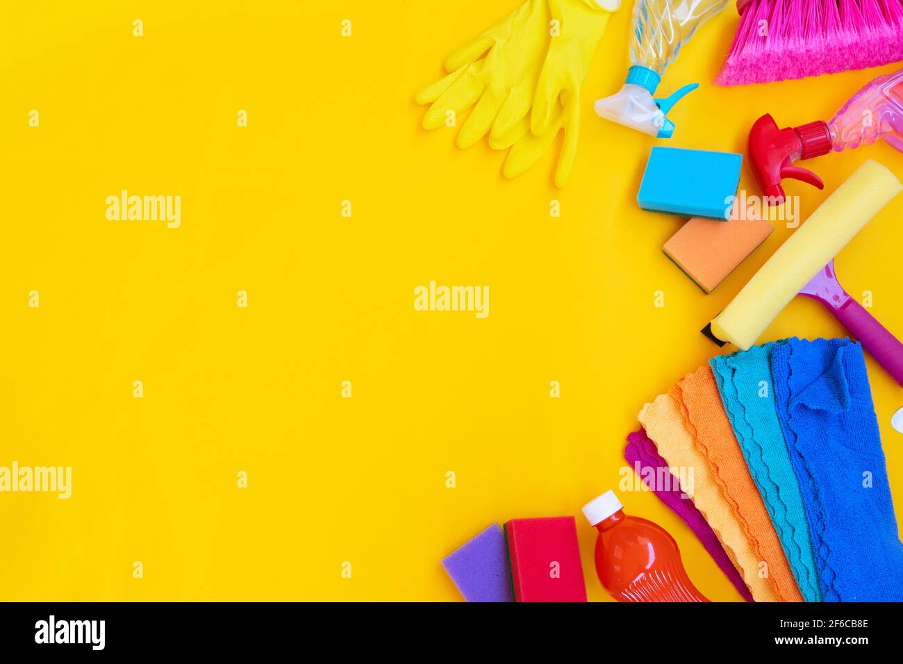 cleaning supplies tools on plain background Stock Photo - Alamy