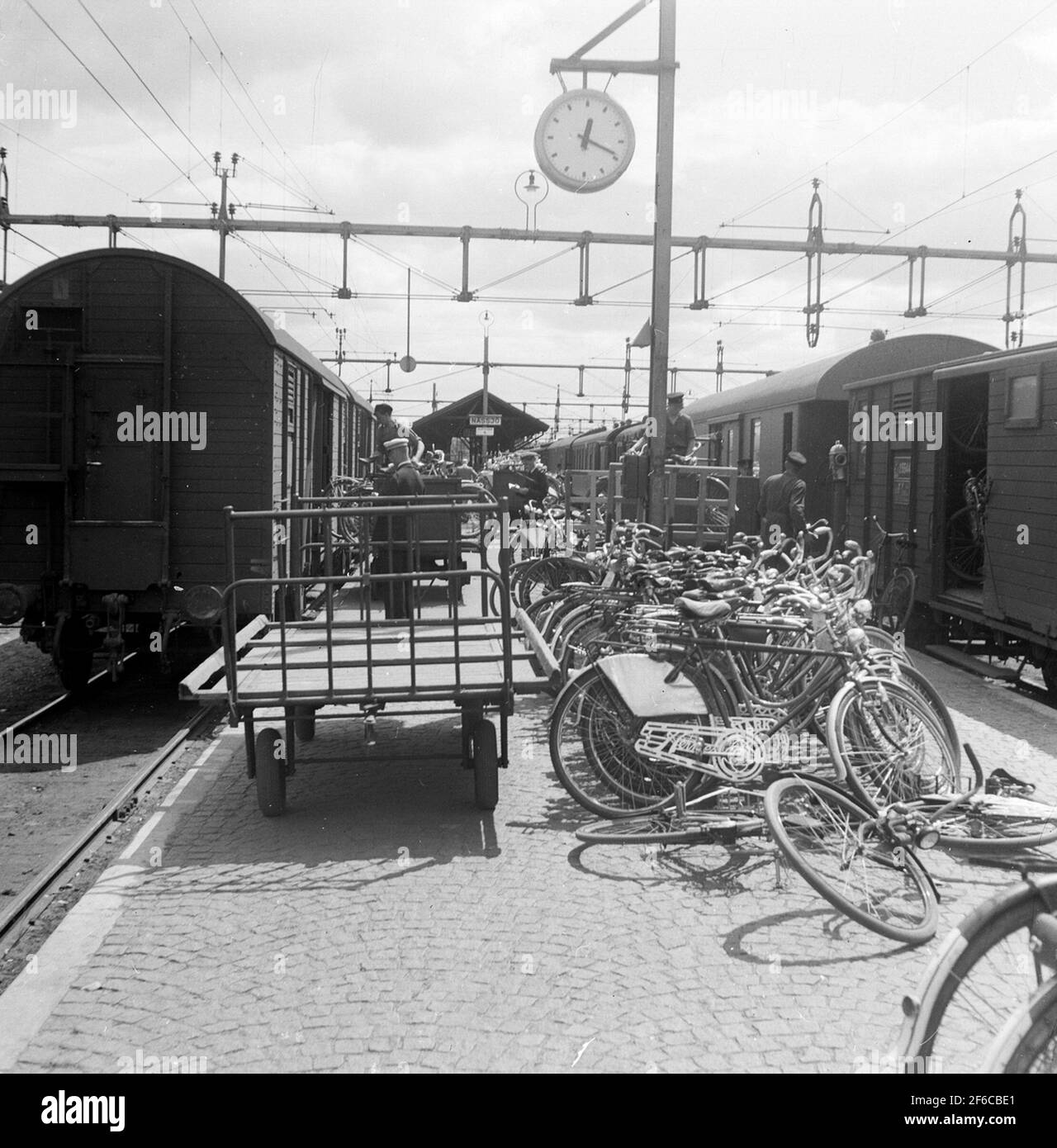 Freight wagons are loaded with bicycles on platform 4 at Nässjö station ...