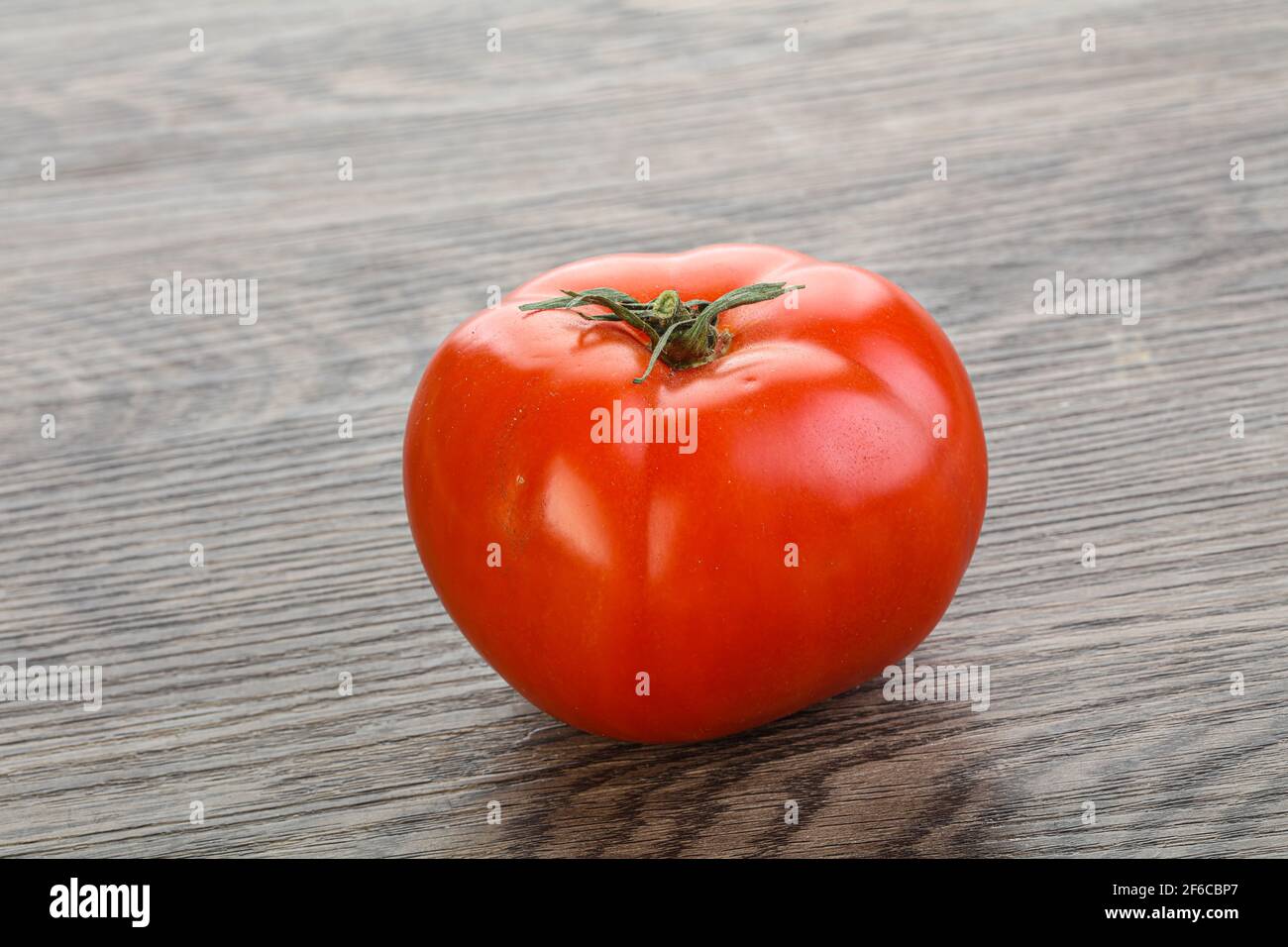 Red ripe big juicy tomato isolated Stock Photo - Alamy