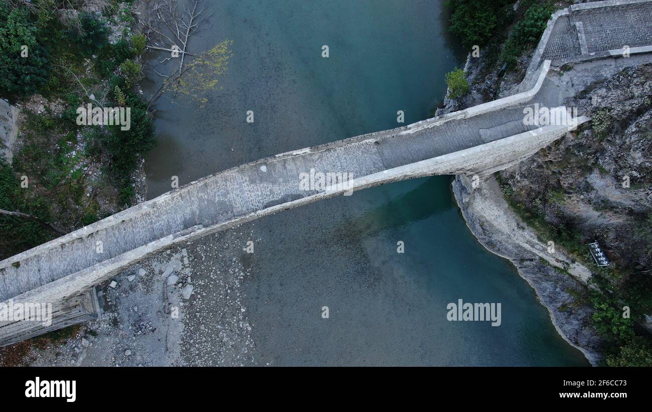 Old stone bridge of Konitsa, Aoos river, aerial drone view, Epirus ...