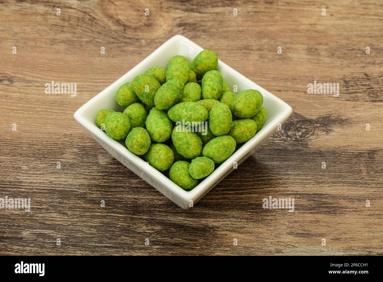 Spicy wasabi peanuts snack in the bowl Stock Photo - Alamy