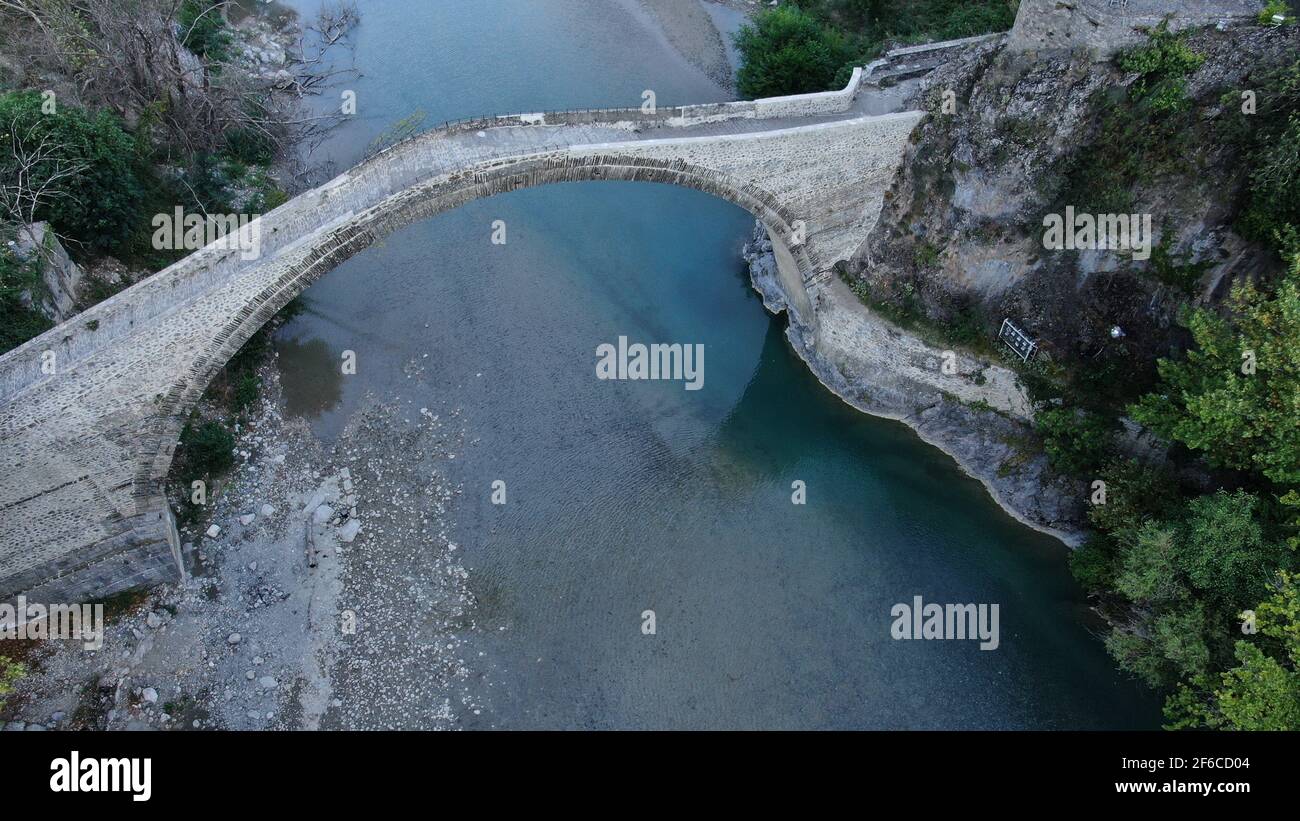 Old stone bridge of Konitsa, Aoos river, aerial drone view, Epirus ...