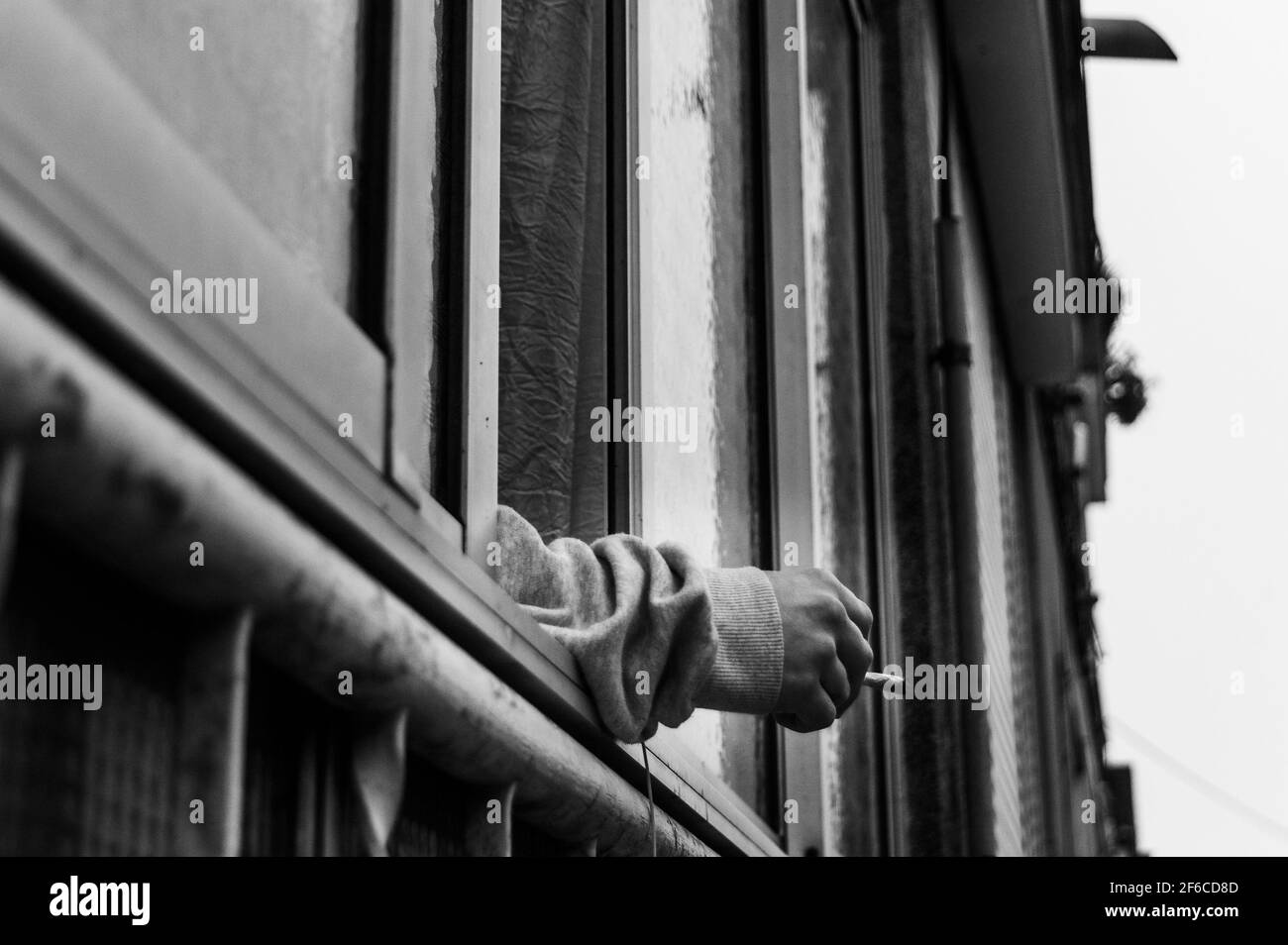 smoking at the window Stock Photo - Alamy