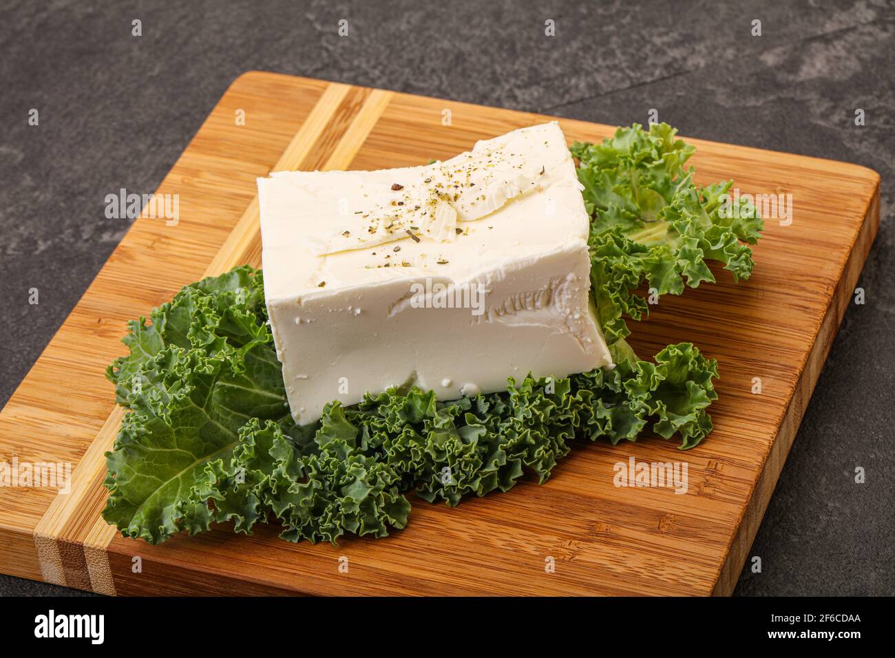 Traditional tasty Greek Feta soft cheese brick Stock Photo - Alamy