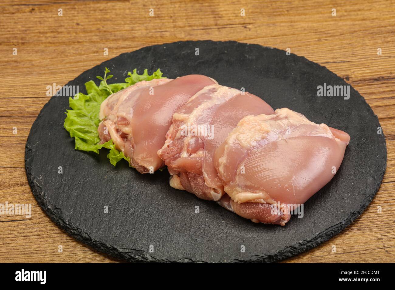 Raw chicken boneless and skinless leg for cooking Stock Photo - Alamy