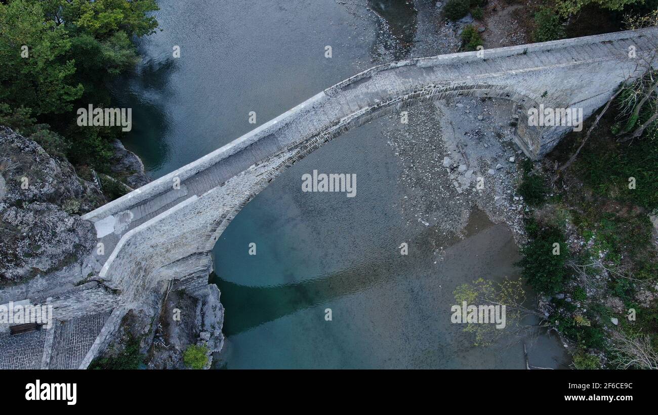 Old stone bridge of Konitsa, Aoos river, aerial drone view, Epirus ...