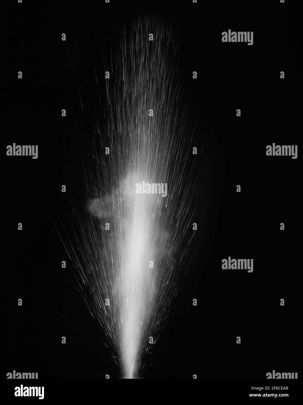 Splashing hot water with steam on a black background. Abstract ...