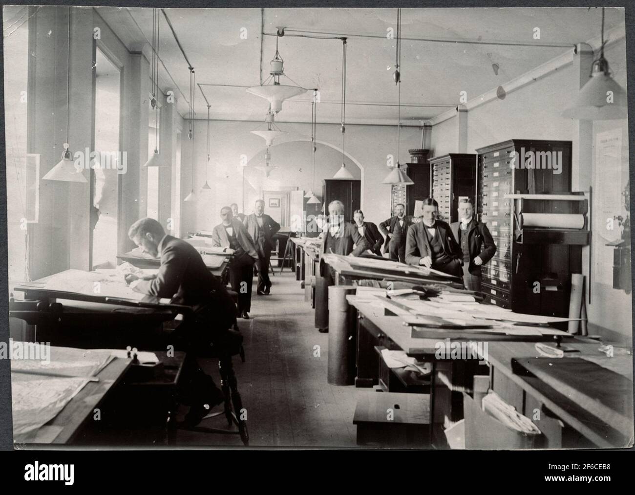 Group photo from machine agency drawing around 1900 Stock Photo - Alamy