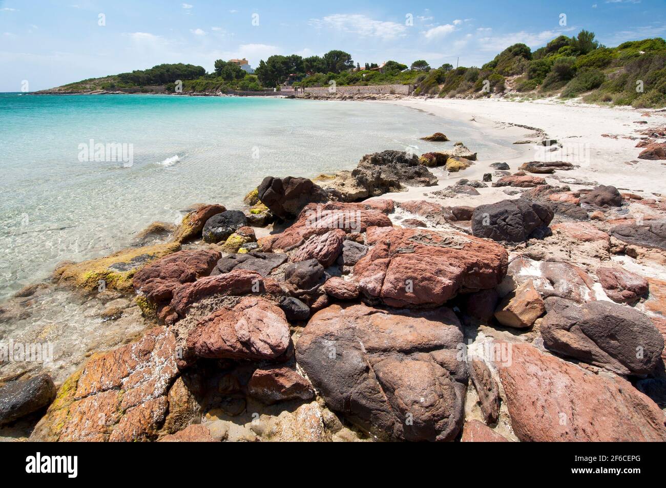 crystal clear water, white sand and colored rocks in Girin beach ...