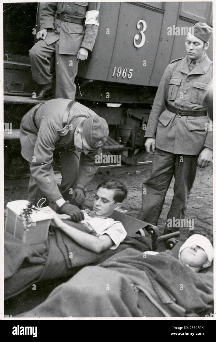 Wounded German soldiers are taken on board Swedish hospital saws Stock ...