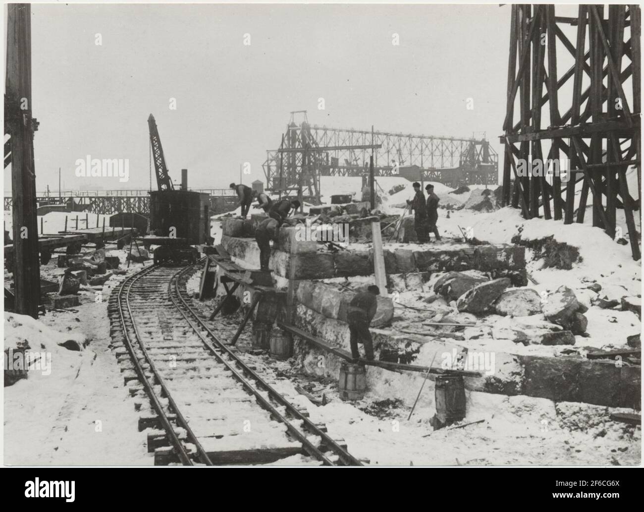Rebuilding the ore storage bridge on black island in Luleå Stock Photo ...