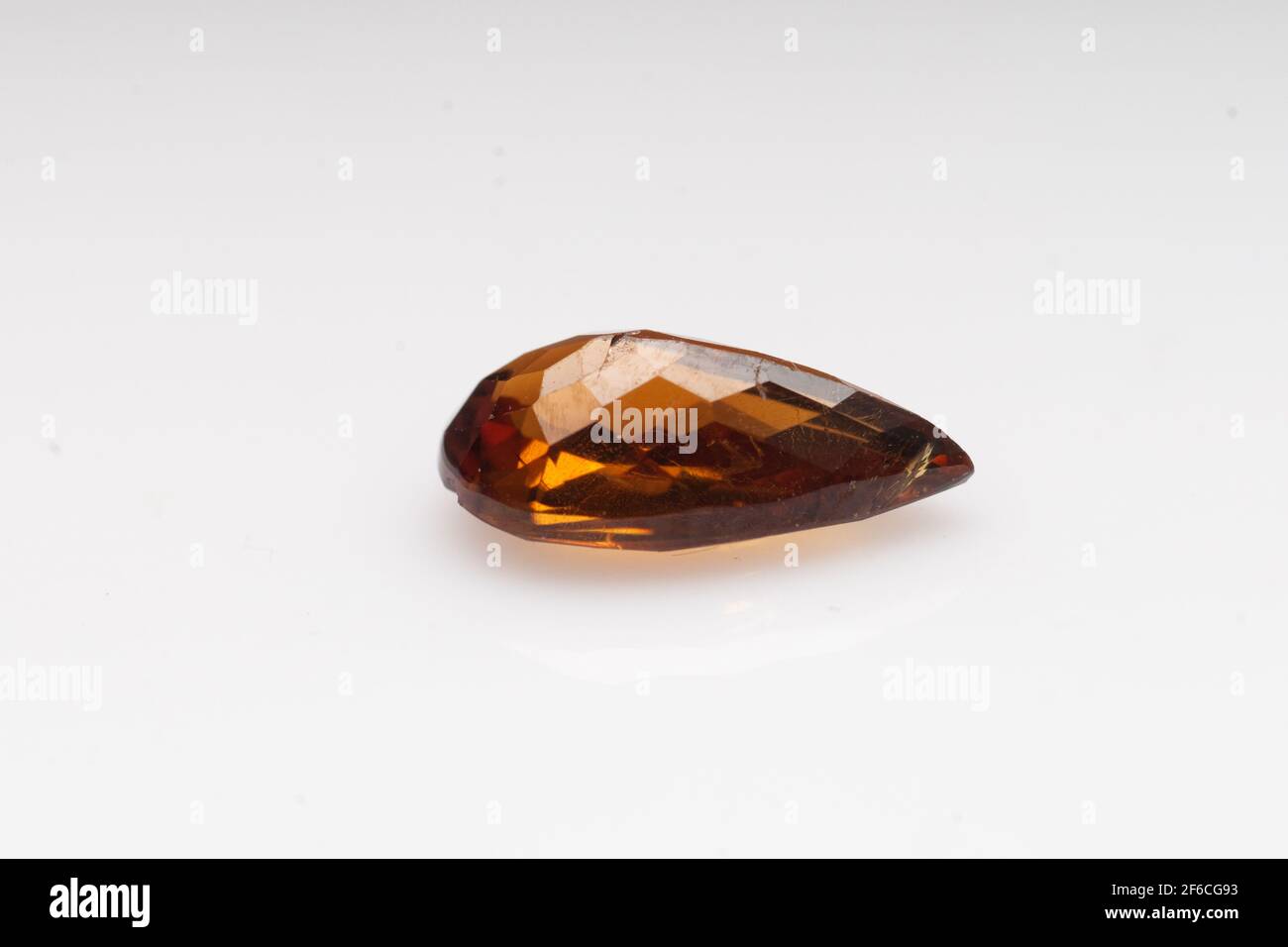 Natural gemstone garnet grossular on white background Stock Photo - Alamy