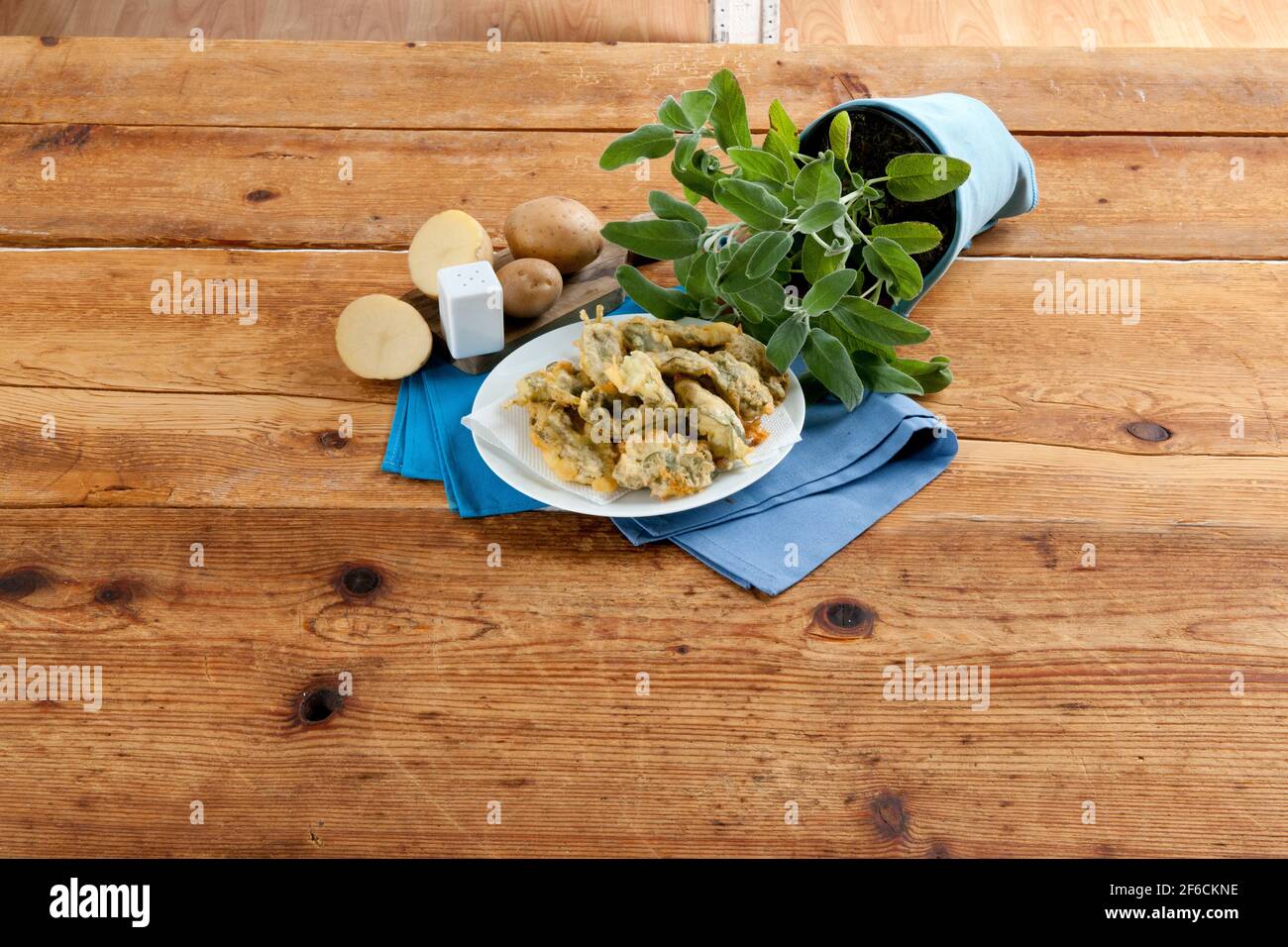 Fried sage potatoes and vegetables Stock Photo - Alamy