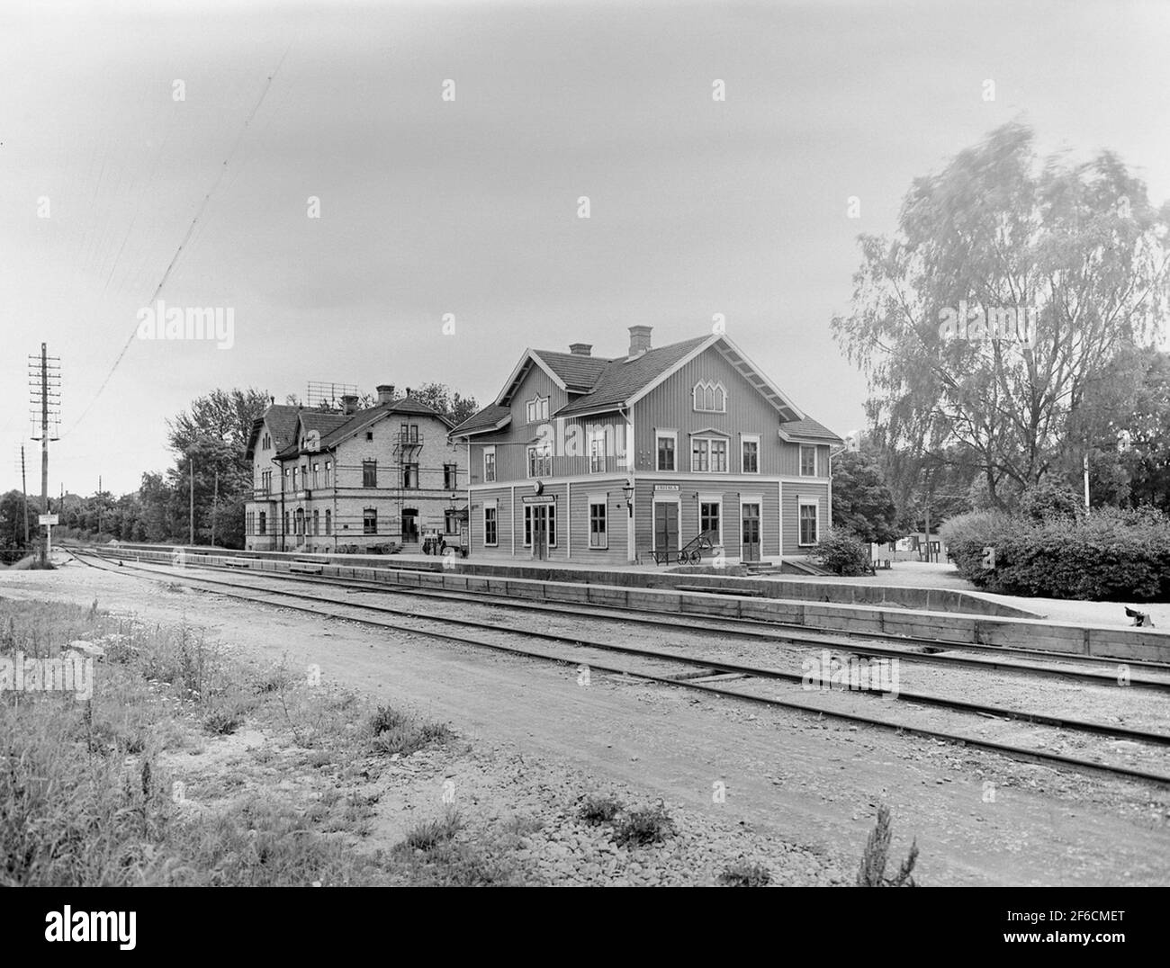 Fritsla railway station and railway hotel Stock Photo - Alamy