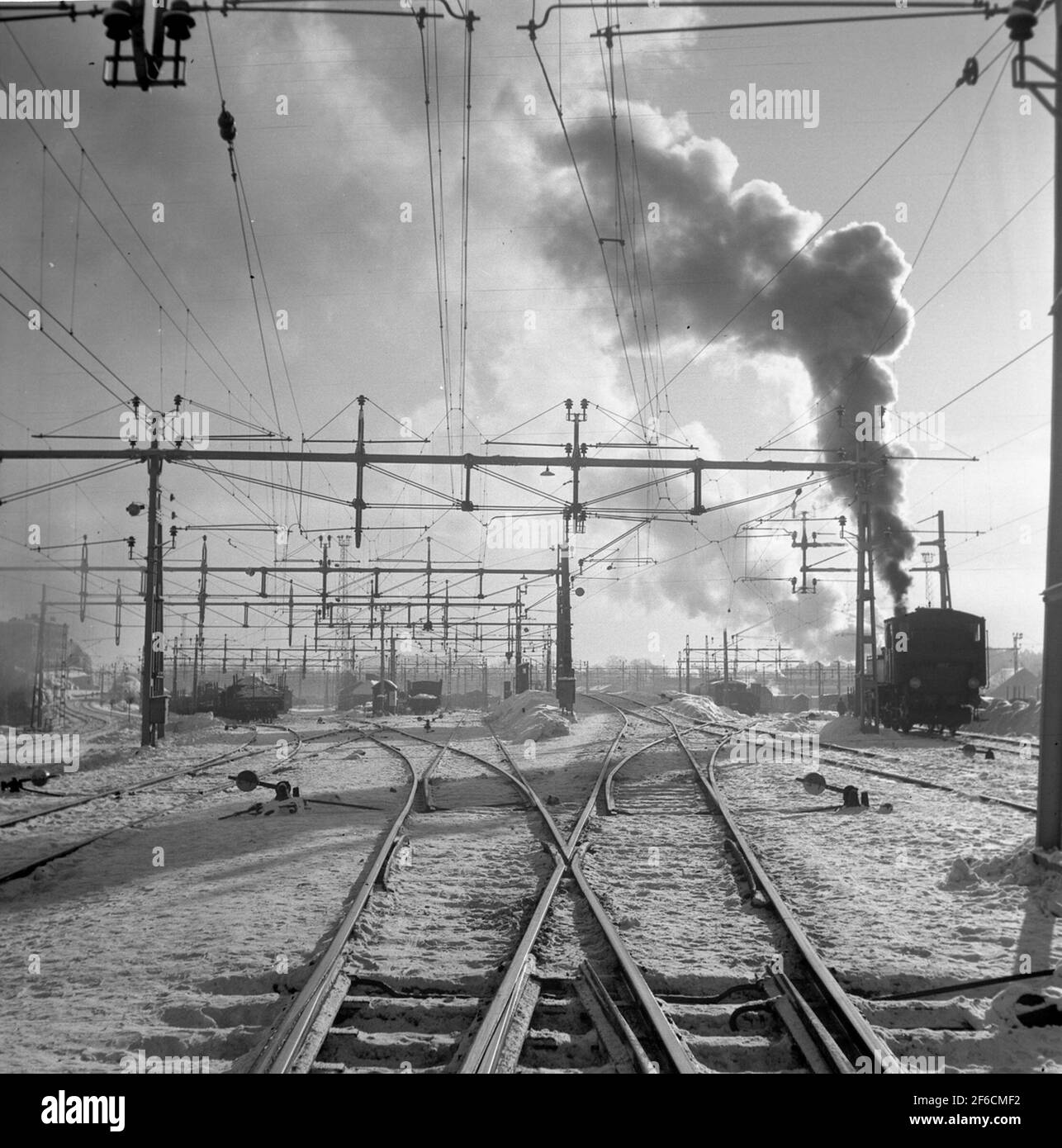 Steam locomotive switches on the railroad Stock Photo - Alamy