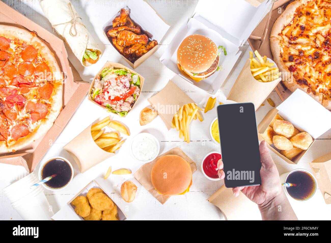 Delivery fastfood ordering food online concept. Large set of assorted ...