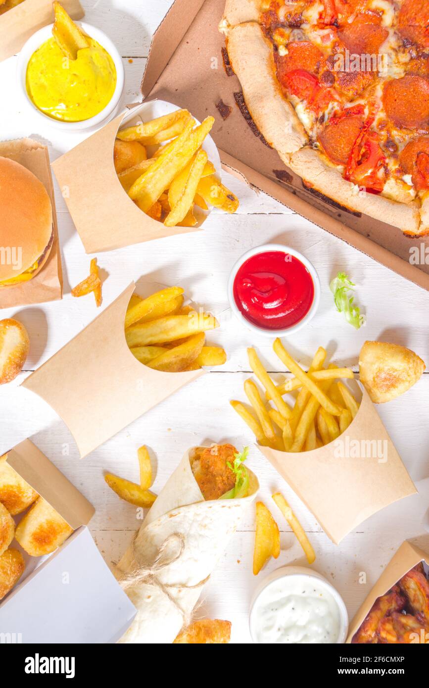 Delivery fastfood ordering food online concept. Large set of assorted ...