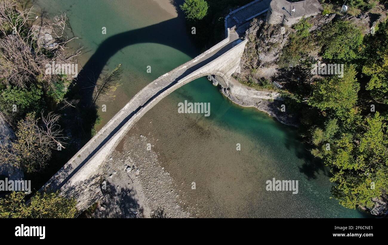 Old stone bridge of Konitsa, Aoos river, aerial drone view, Epirus ...