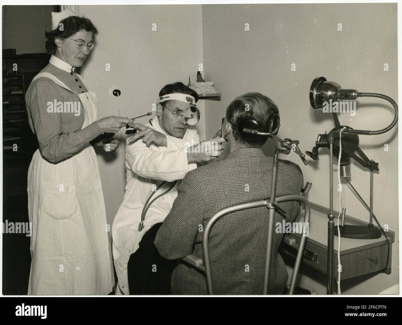 The doctor's office SJ. Dr. Beck. with a patient Stock Photo - Alamy