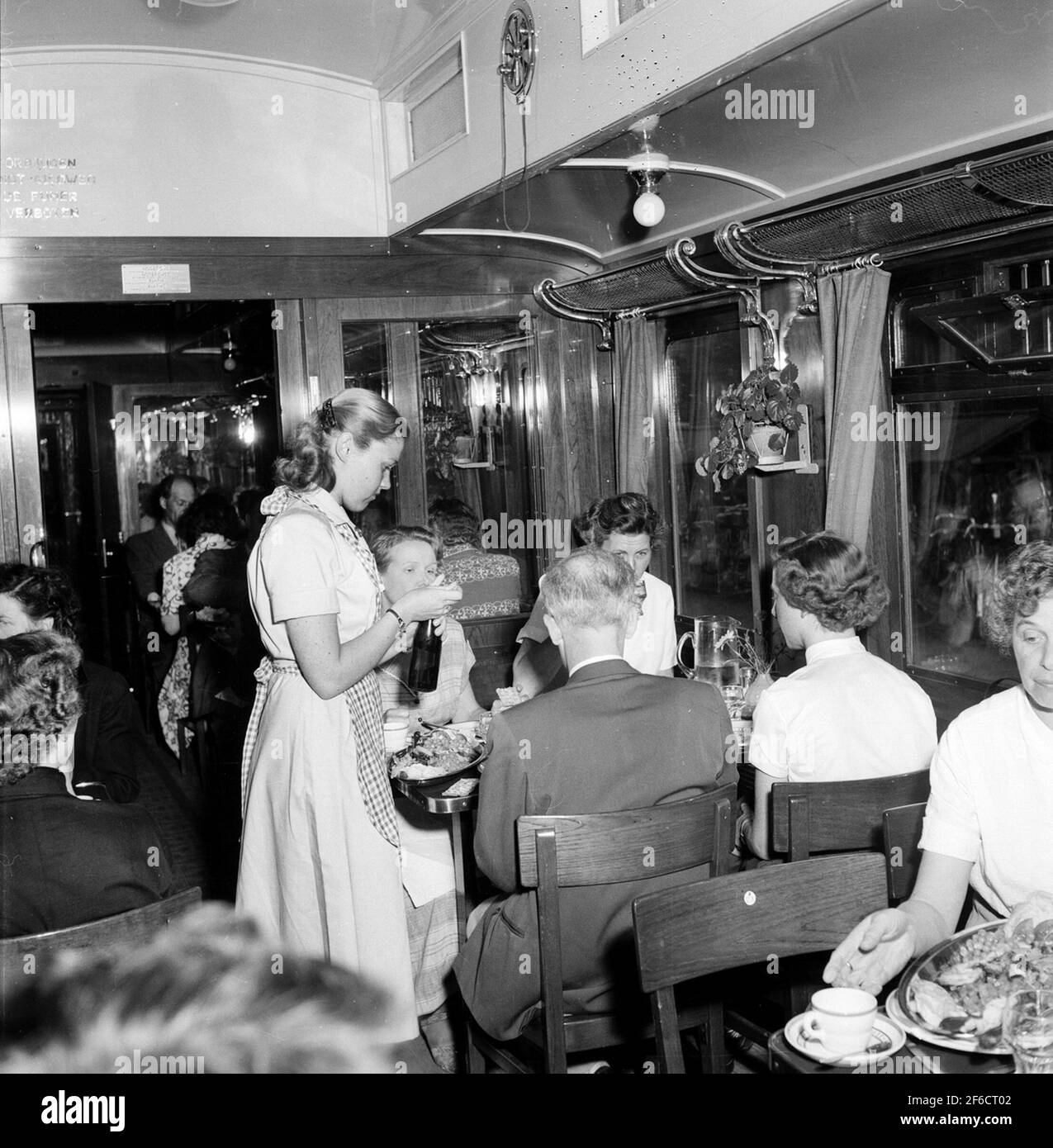 The state railways, SJ train home. Restaurant car with food guests and ...