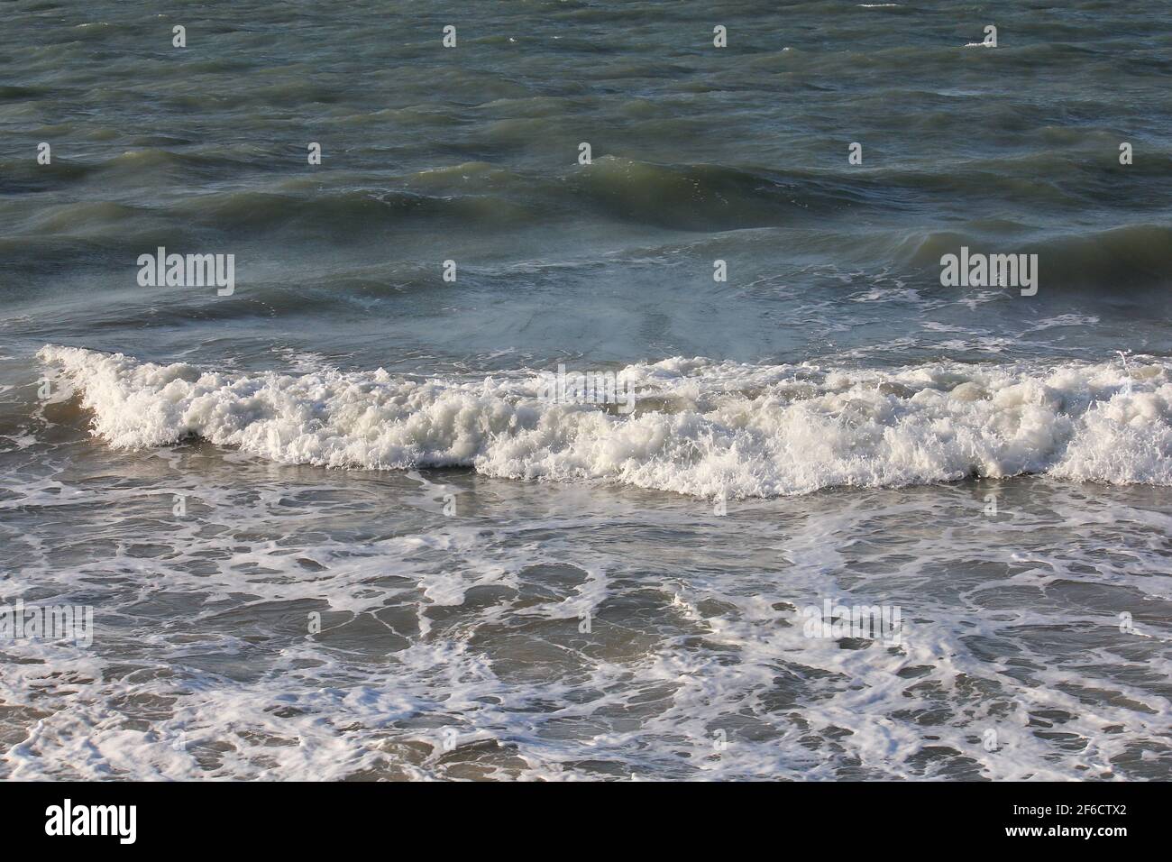 wild whitecaps from the Coral sea hitting the shore, kinetic energy ...