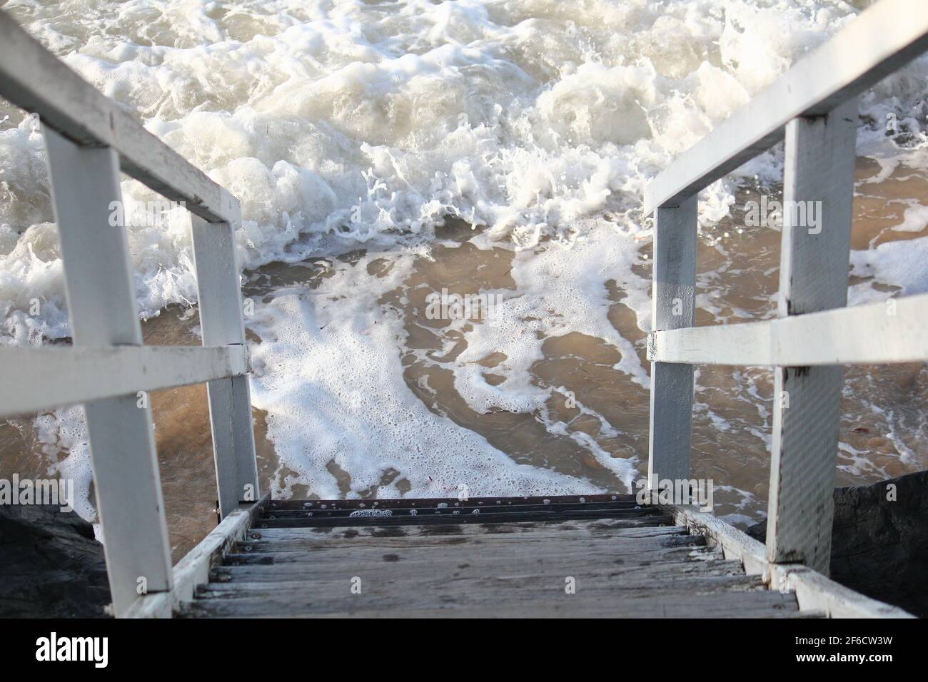 wild whitecaps from the Coral sea hitting the shore, kinetic energy ...