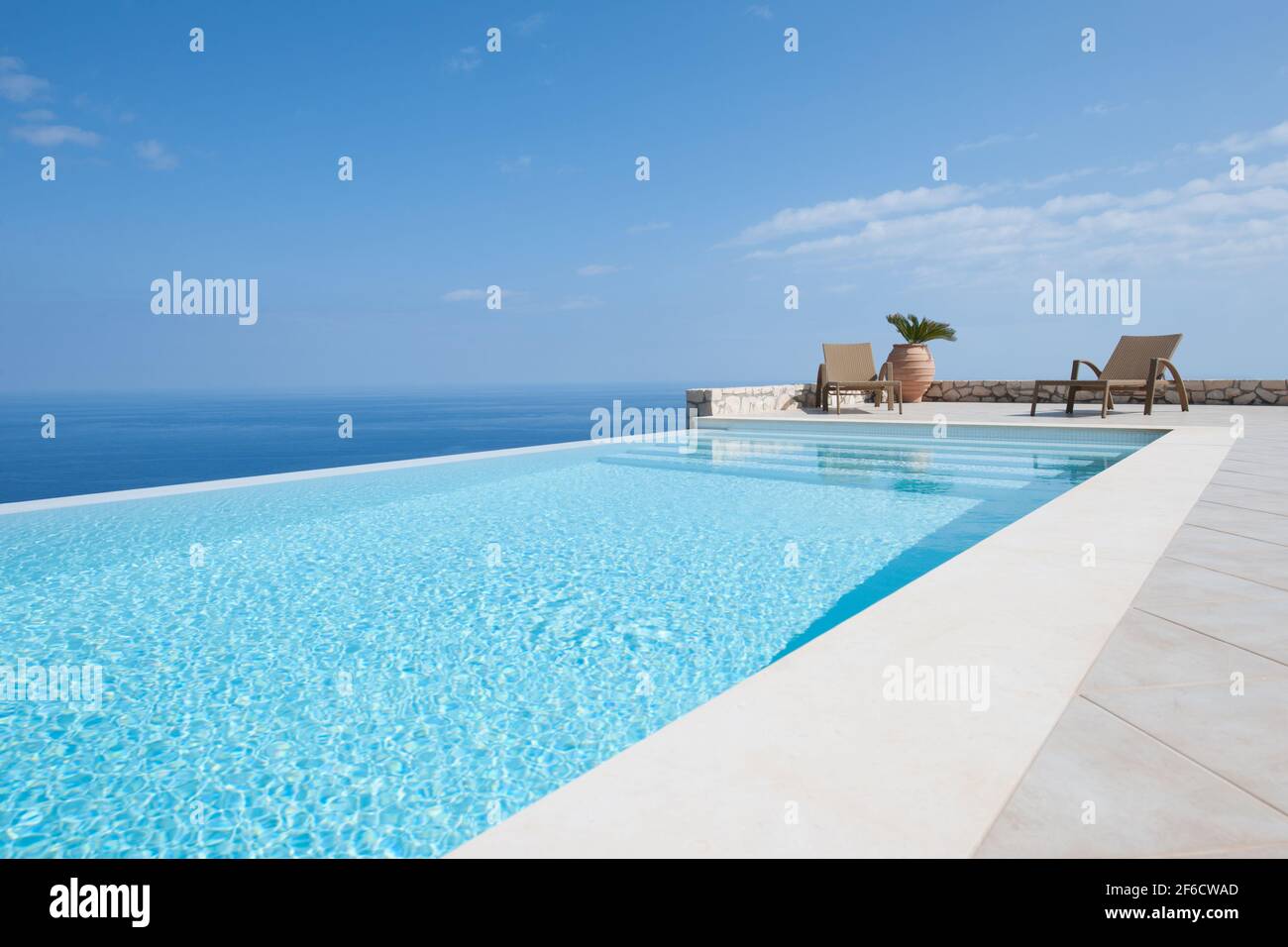 Luxury home with infinity pool on the ocean for a dream vacation Stock ...