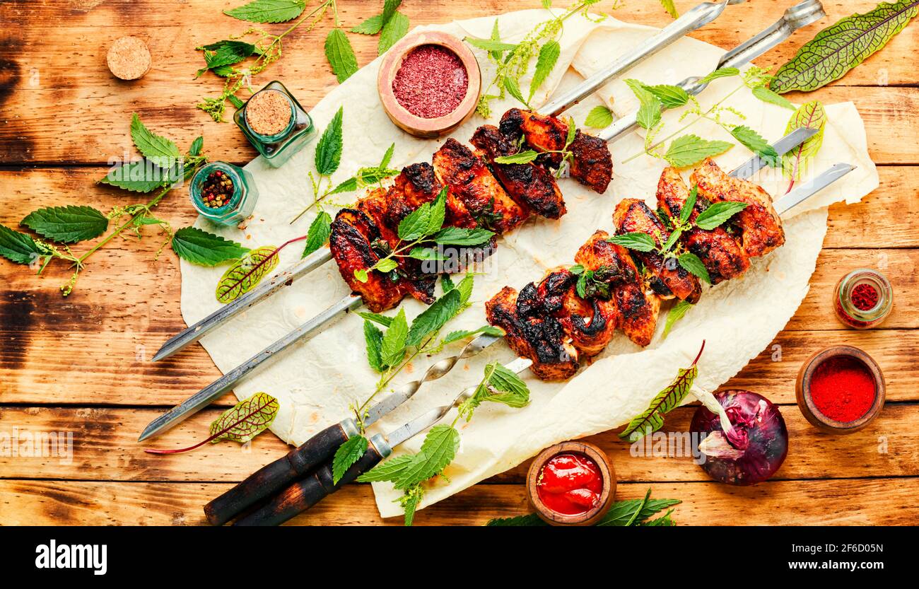 Kebab on skewers with nettle marinade.Meat on skewers,barbecue Stock ...