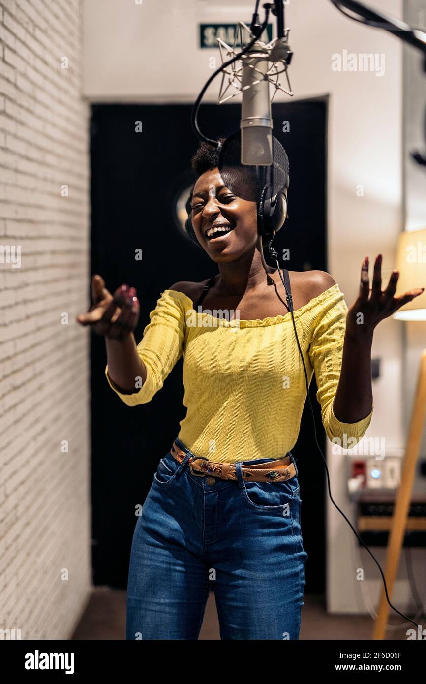Beautiful african singer woman recording hi-res stock photography and ...